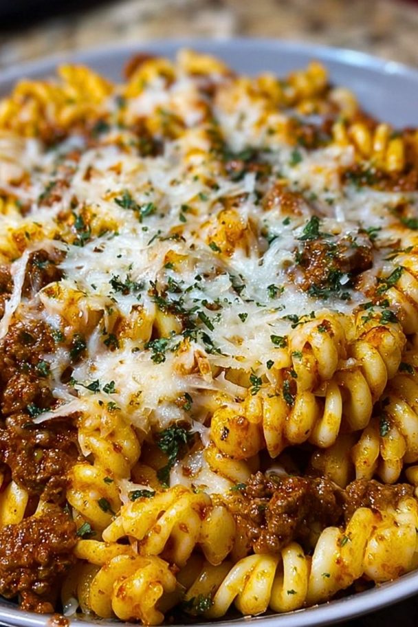 Cheesy Garlic Twisted Pasta with Cajun Ground Beef and Alfredo Velveeta ...